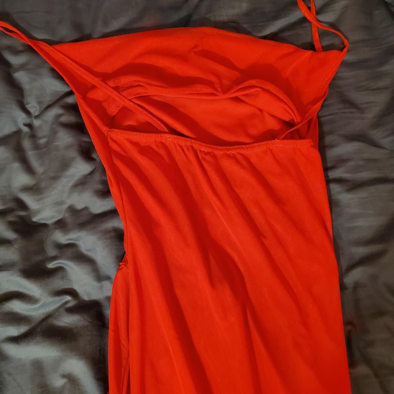 Red tight fit party dress, loose neck and free back... - Depop