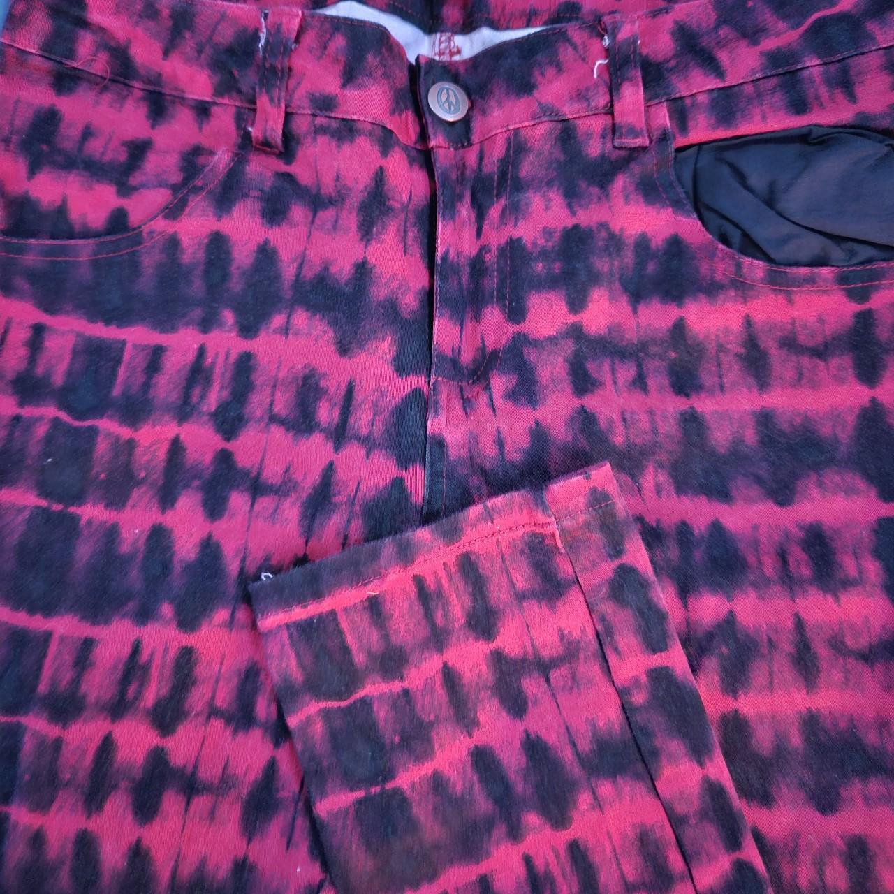 red and black tiedye skinny jeans, jegging material - Depop