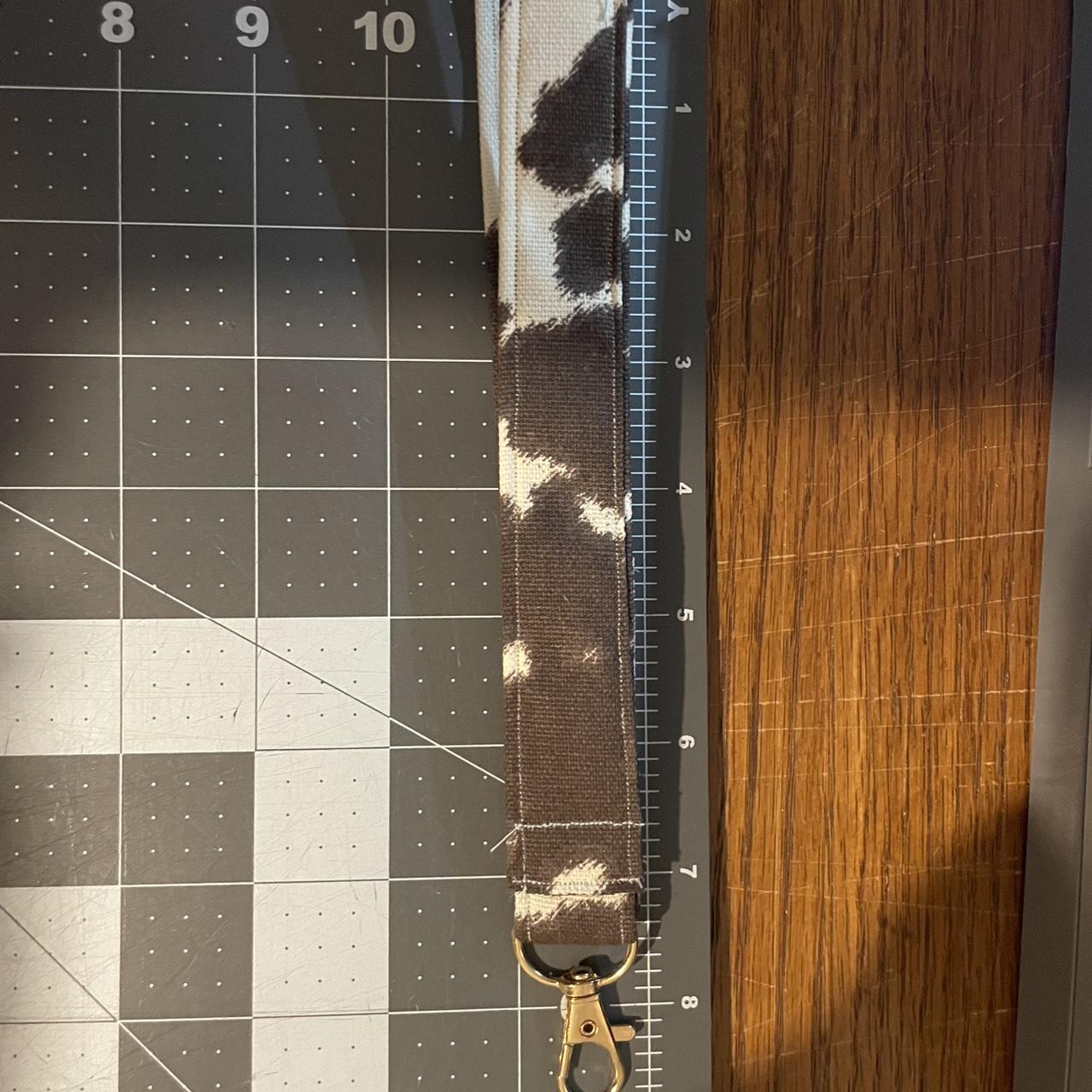 Adorable brown cow print keychain wristlets.... | Depop