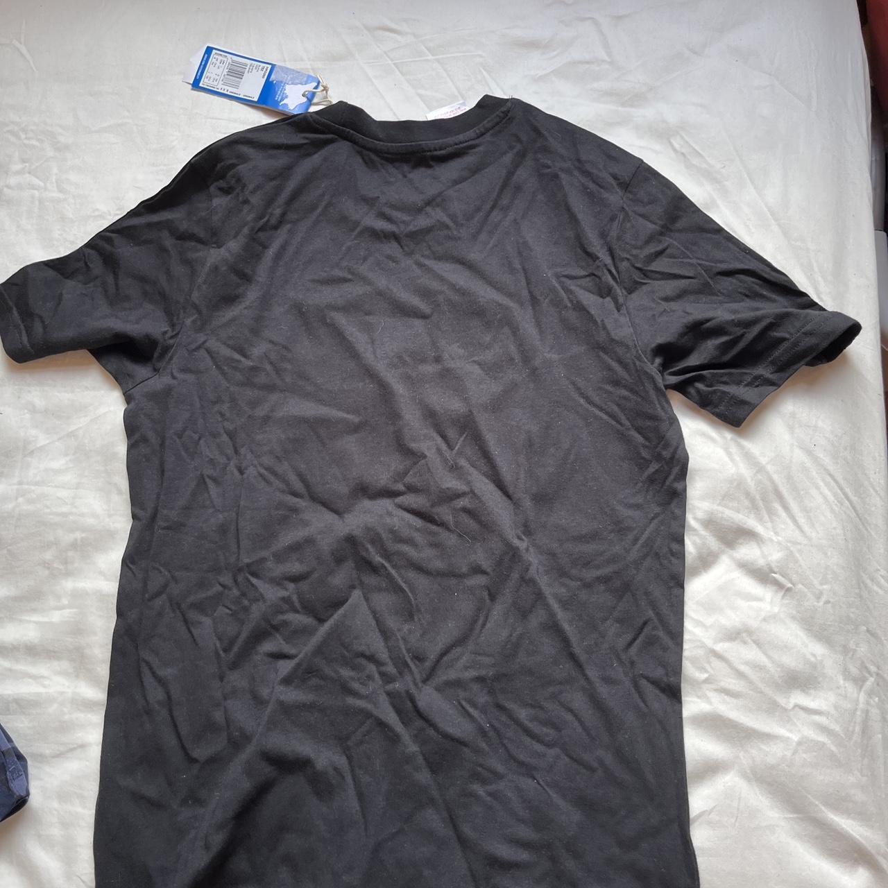 Black adidas shirt with box graphic on front blue... - Depop