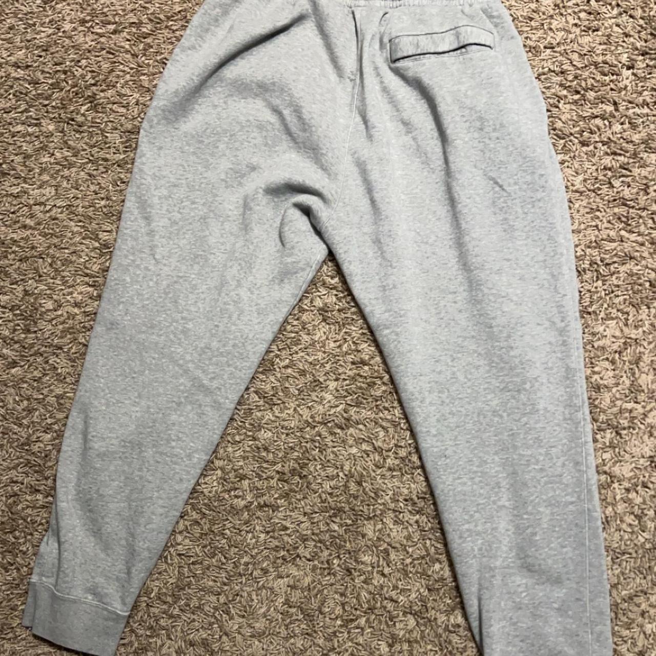 Gray Nike Pants There was a little hole on the back... - Depop