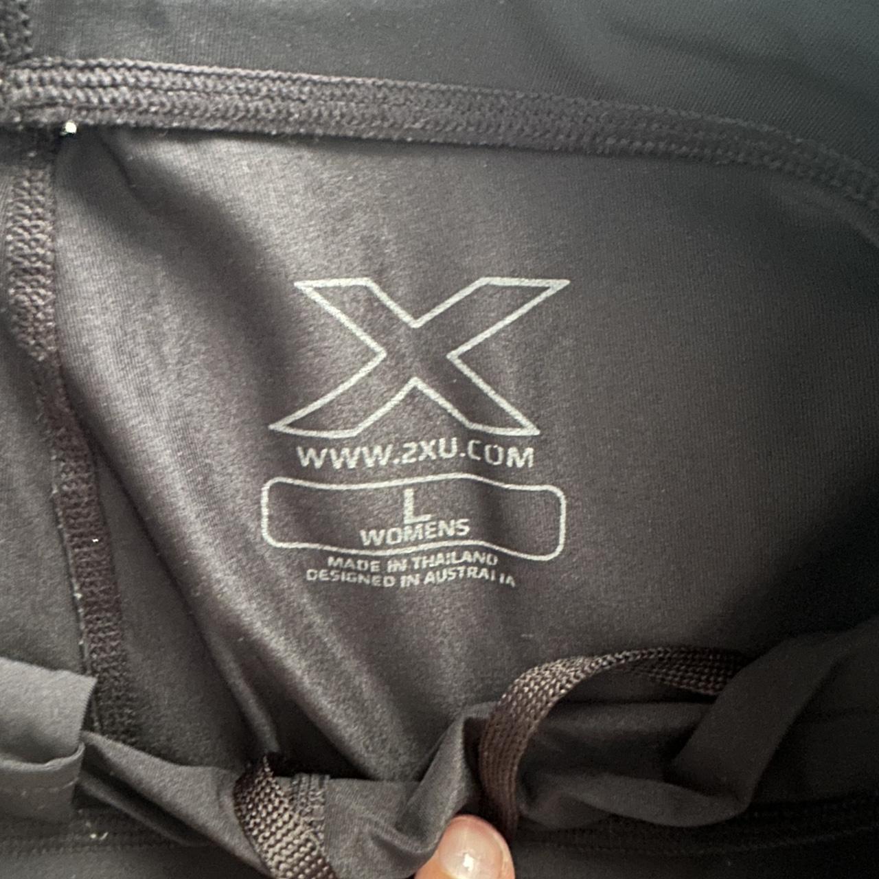 2XU gym leggings with light blue symbol Size... - Depop