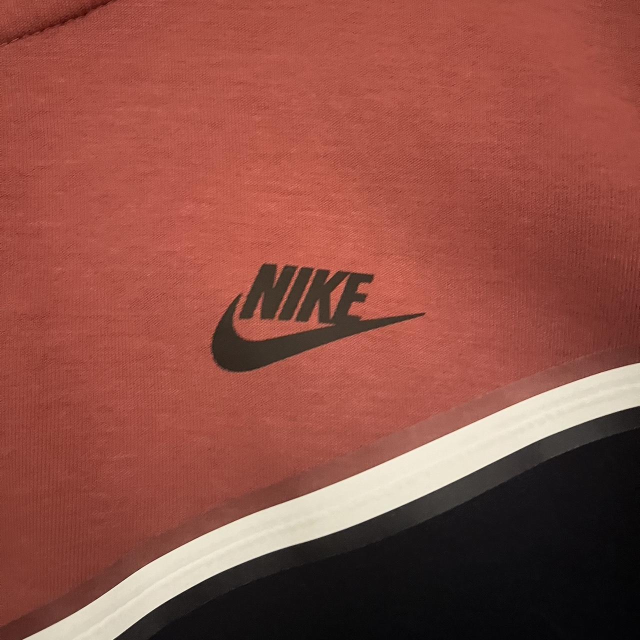 Nike tech Size: Large rip/hole on the right elbow... - Depop