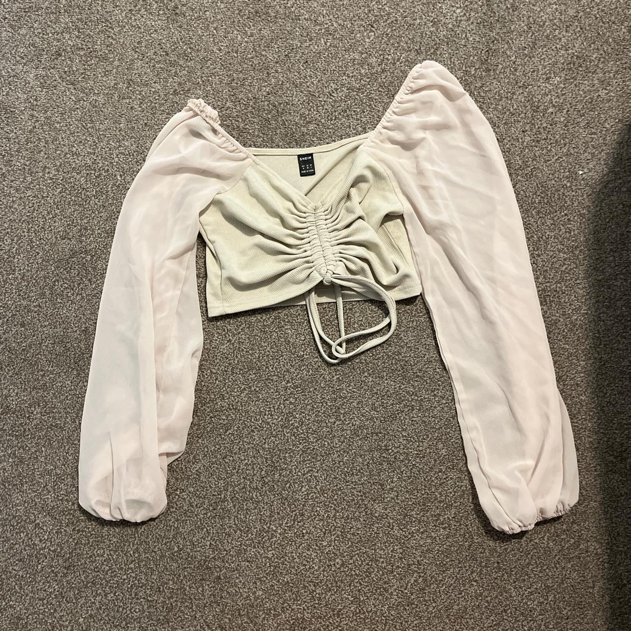 Cream top with adjustable front scrunch that is... - Depop