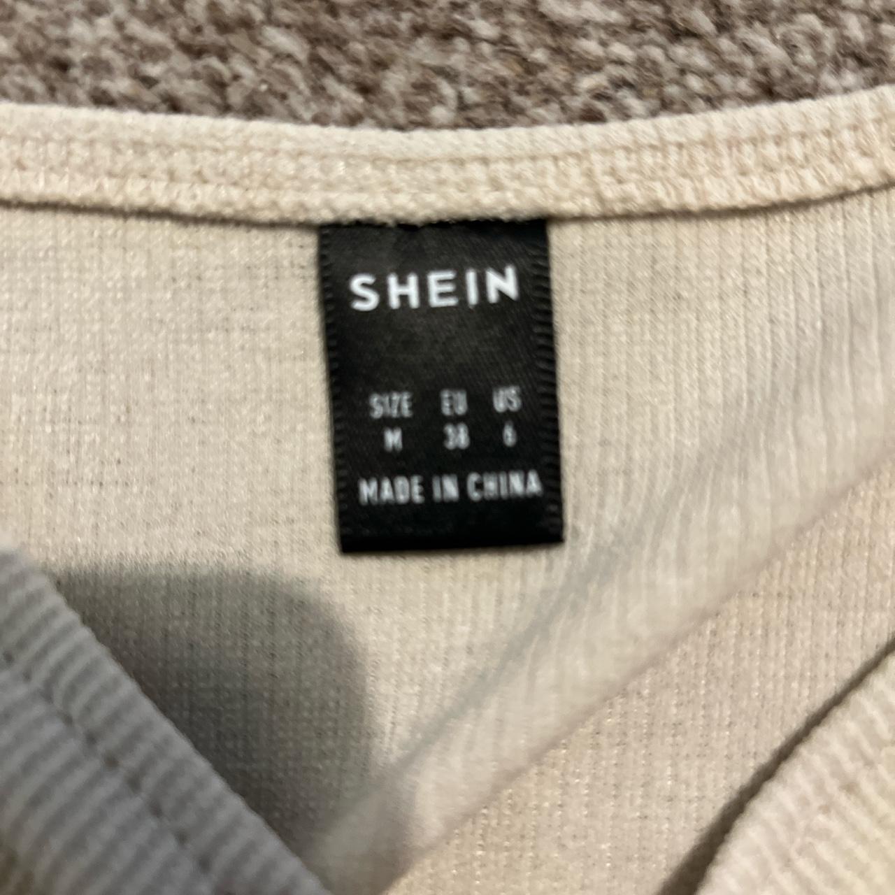 Cream top with adjustable front scrunch that is... - Depop