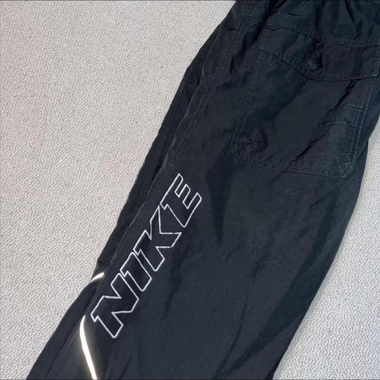 Nike shell pants. Elastic adjustable cuffed leg.... - Depop