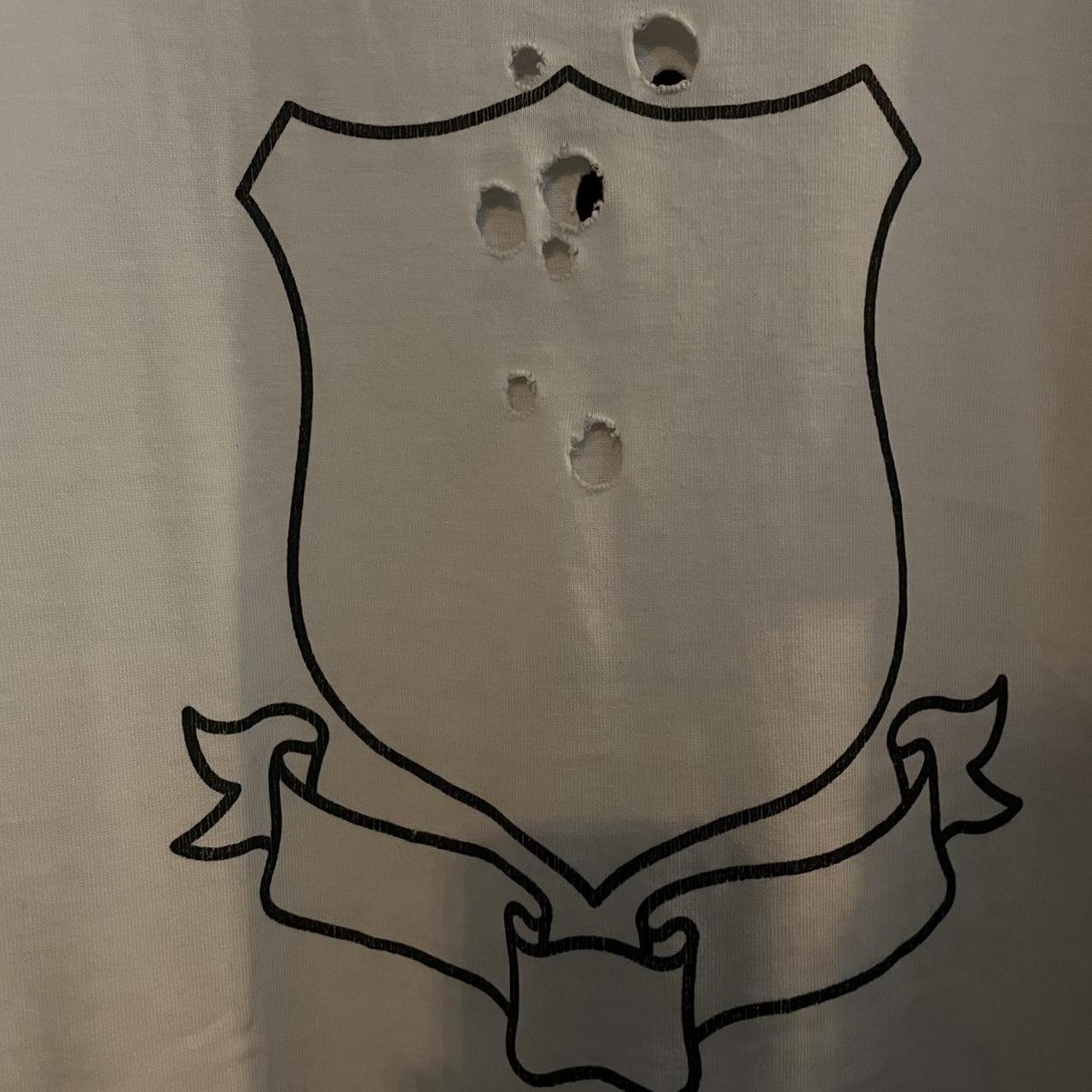 !!NFS!! Number nine shield bullet hole shirt Size... - Depop