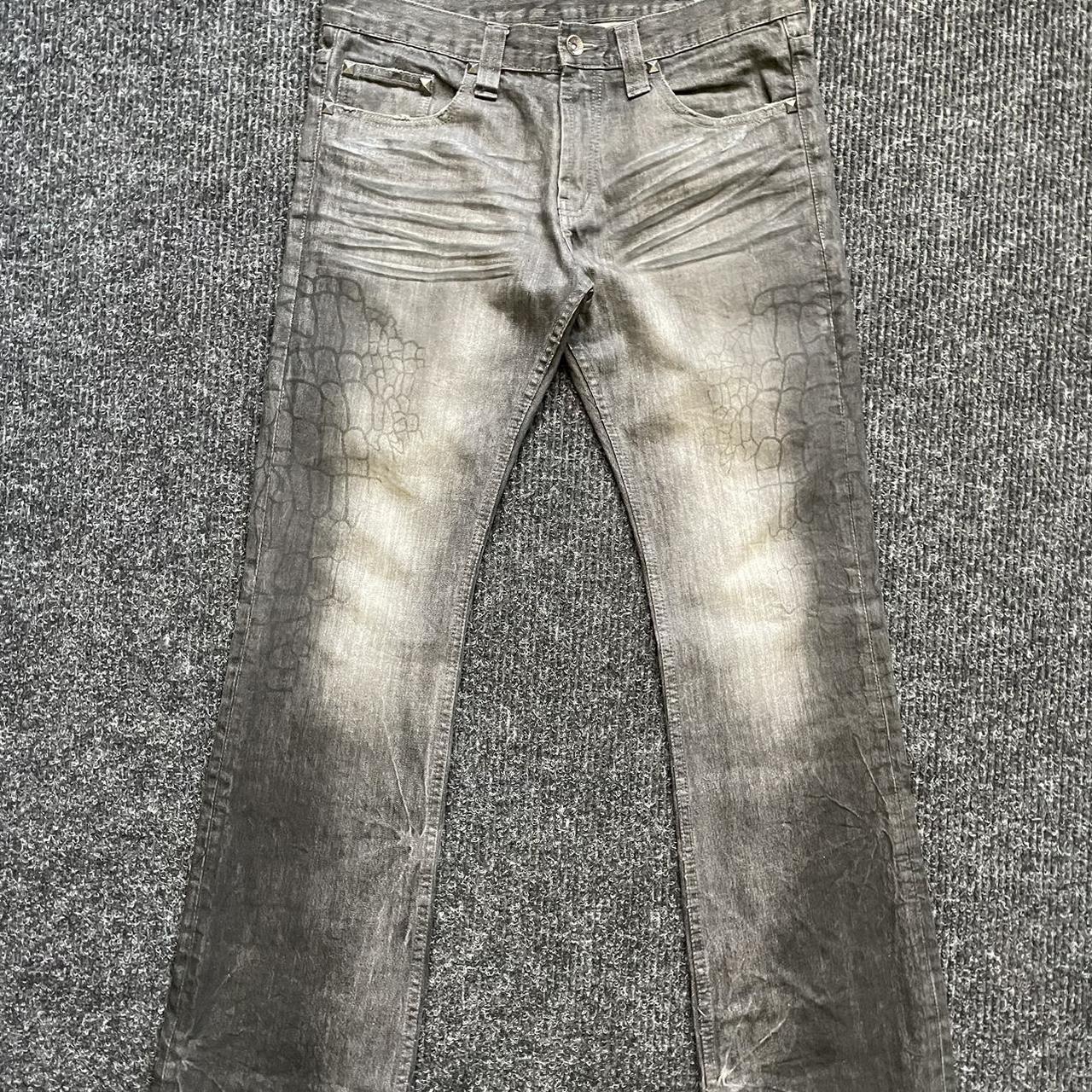 Semantic design reptile print bootcut jeans Send... - Depop