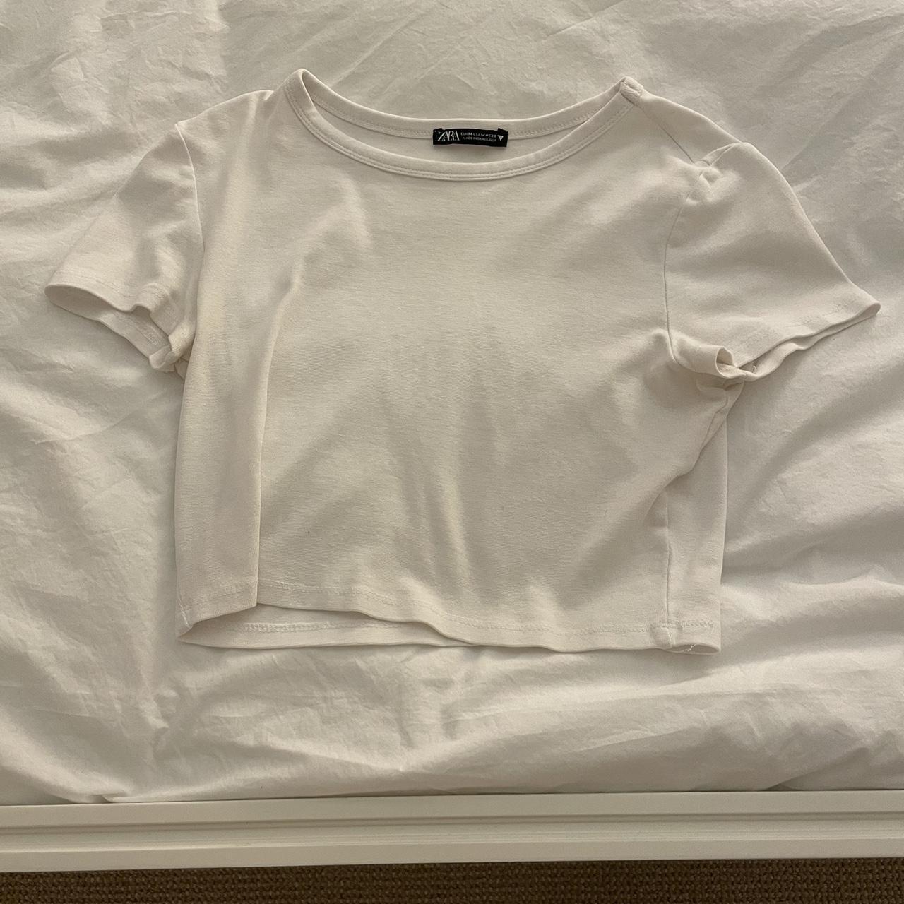 Hi! This is a cute super mini Zara white crop top in... | Depop