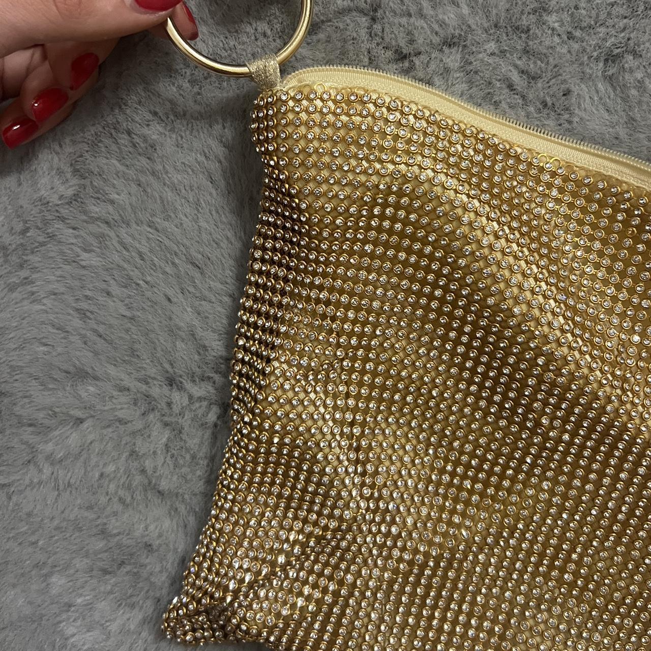 gold chain purse with knotted strap. very spacious... - Depop