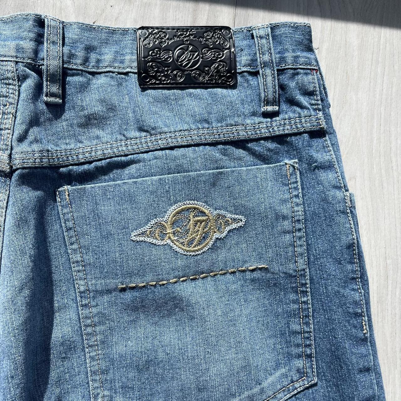 Baggy Sean John jeans with small embroidery on the... - Depop