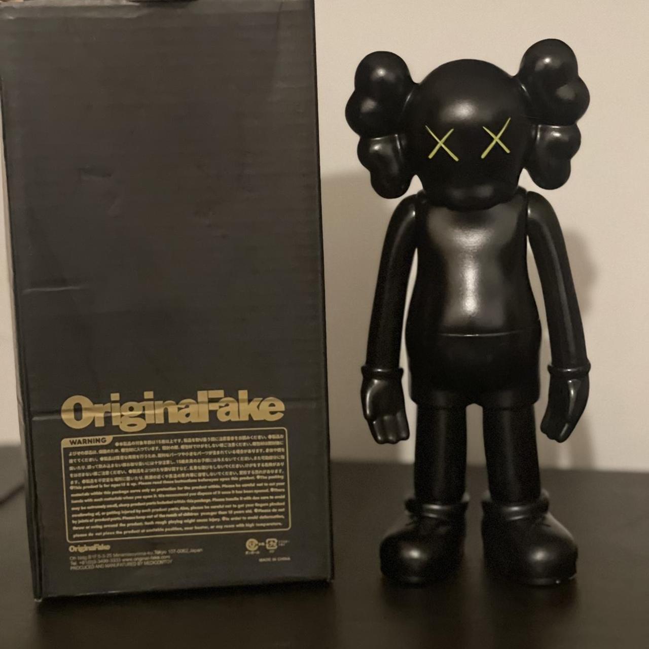 Kaws figure ornament - Depop