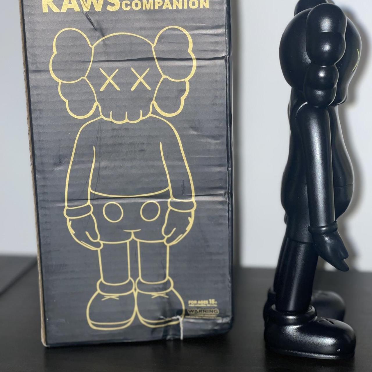 Kaws figure ornament - Depop