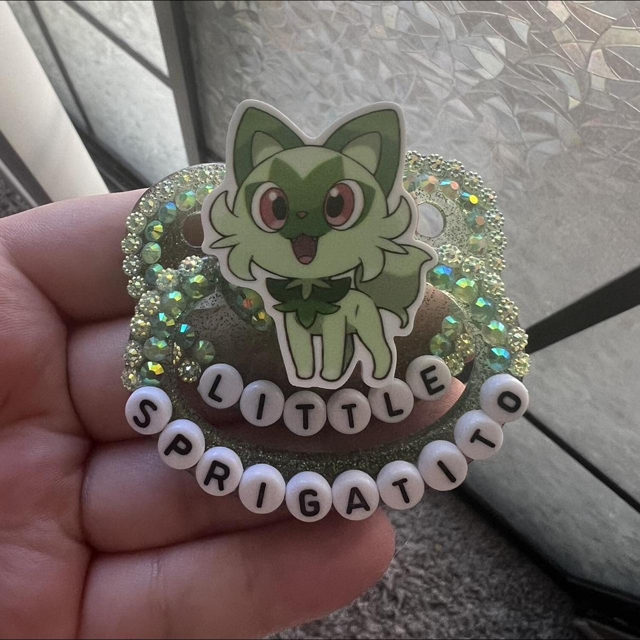 Pokémon Rainbow Collection - Green themed paci with... - Depop