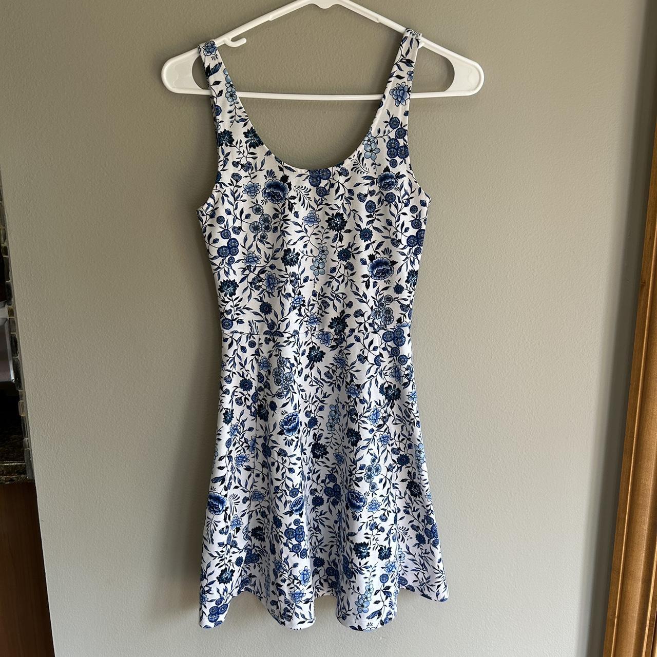 size 4 divided dress white with blue floral... - Depop