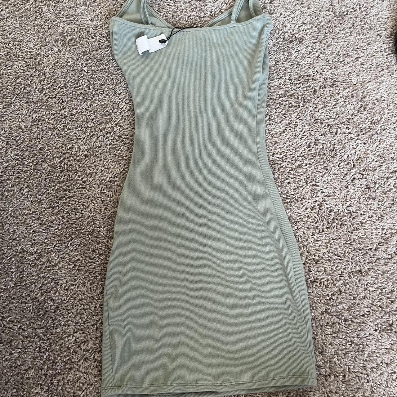 light green body hugging garage dress never worn... - Depop