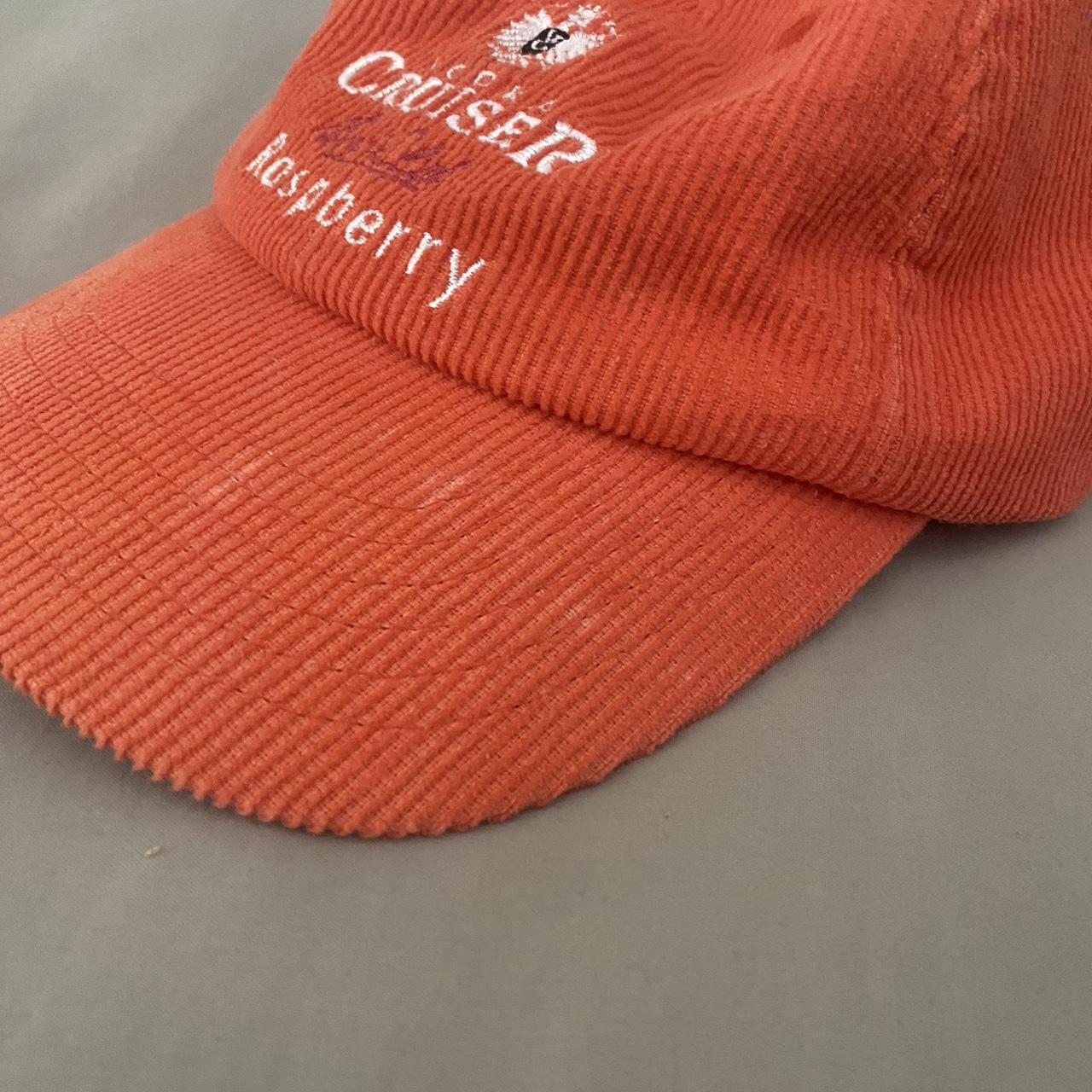 raspberry cruiser hat barely worn small stain on... - Depop