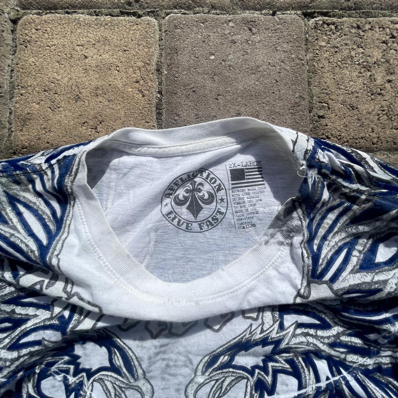 Affliction wrap around print with blue felt in... - Depop