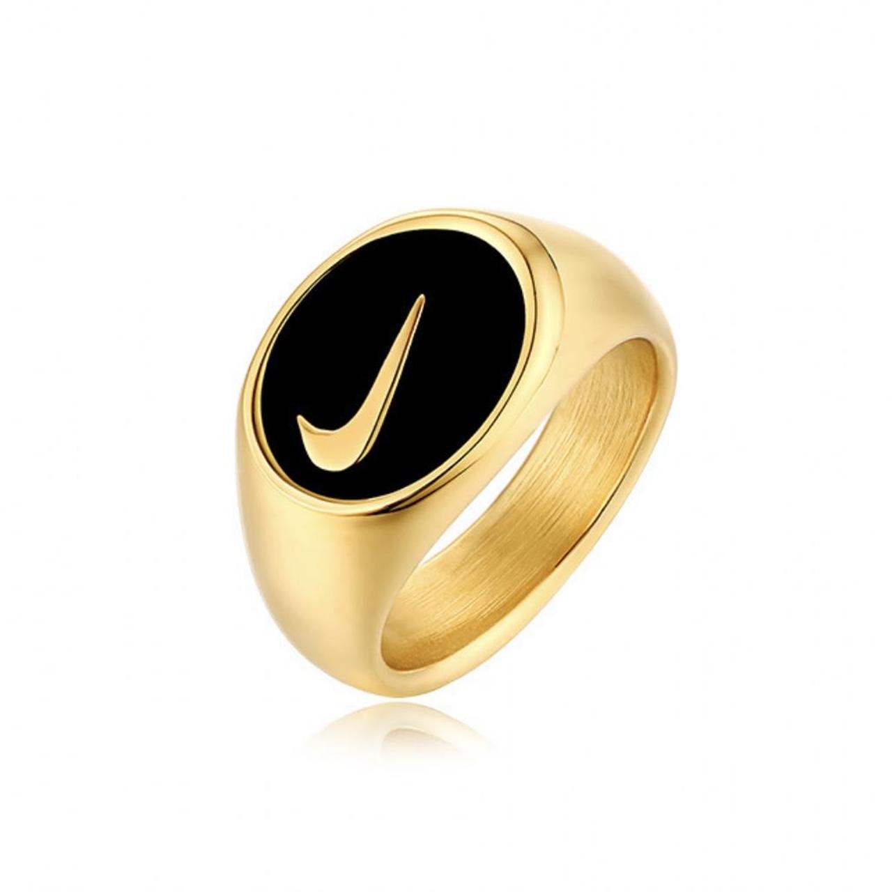Nike style gold ring. Super sick ring, will elevate... - Depop