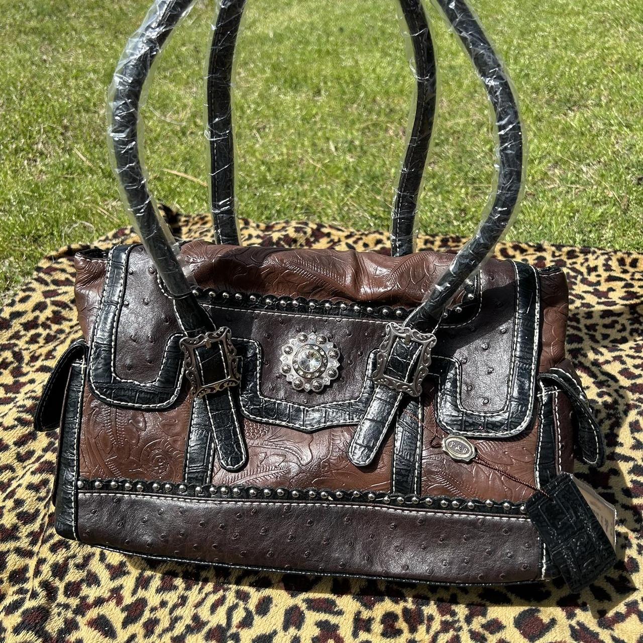 P&G purse is unused and has tags Be sure to look... - Depop