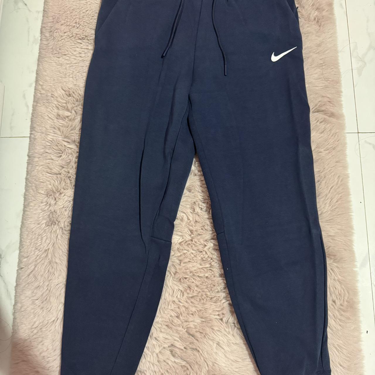 Navy blue Nike Tech Small sweatpants with white logo... | Depop