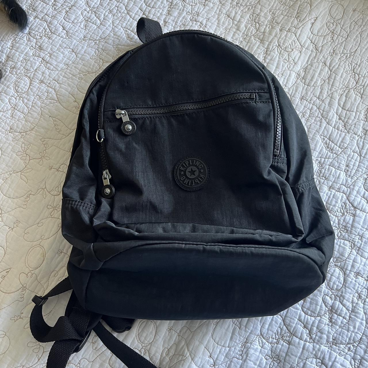 Kipling black backpack - Depop