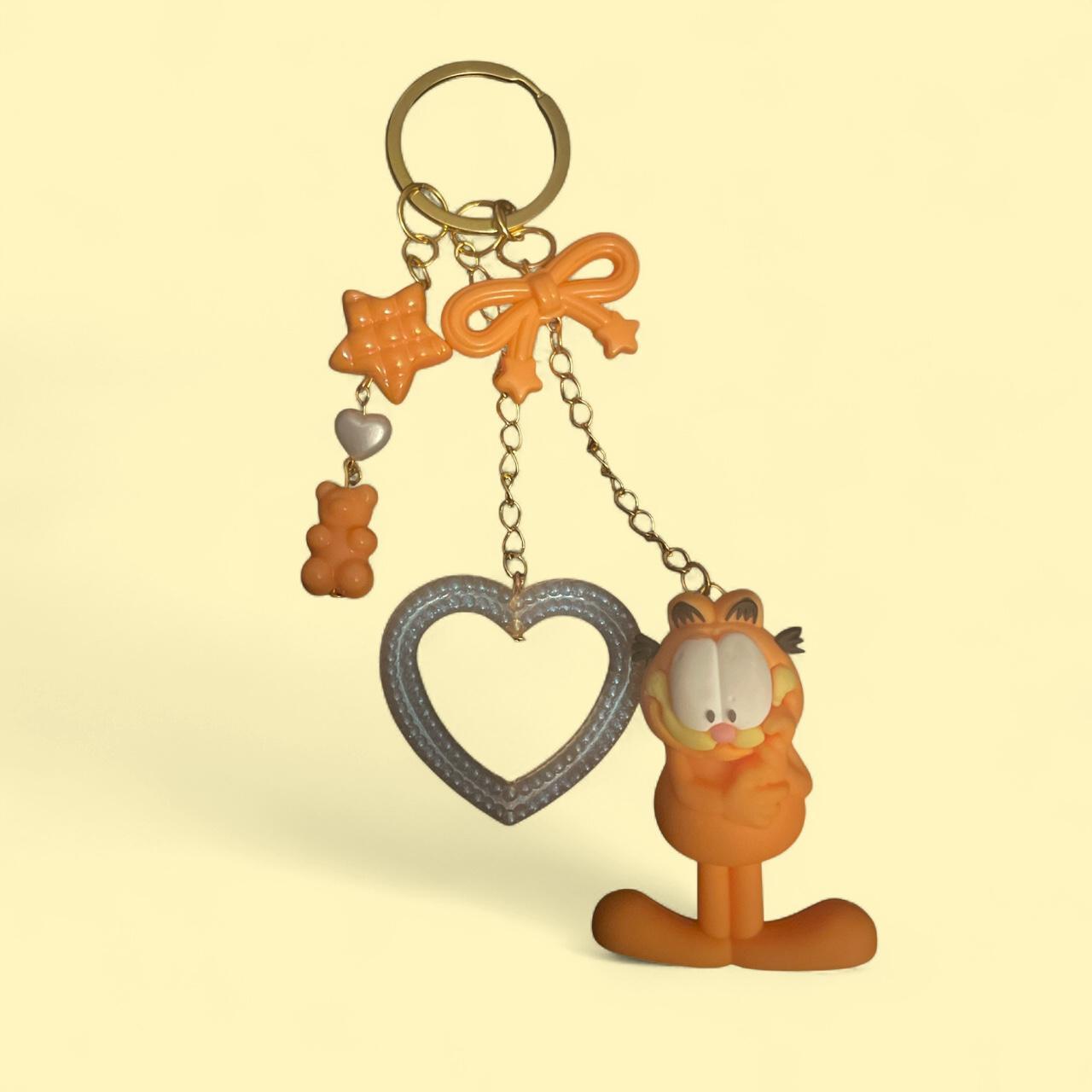 Handmade Garfield keychain featuring a heart, star,... | Depop