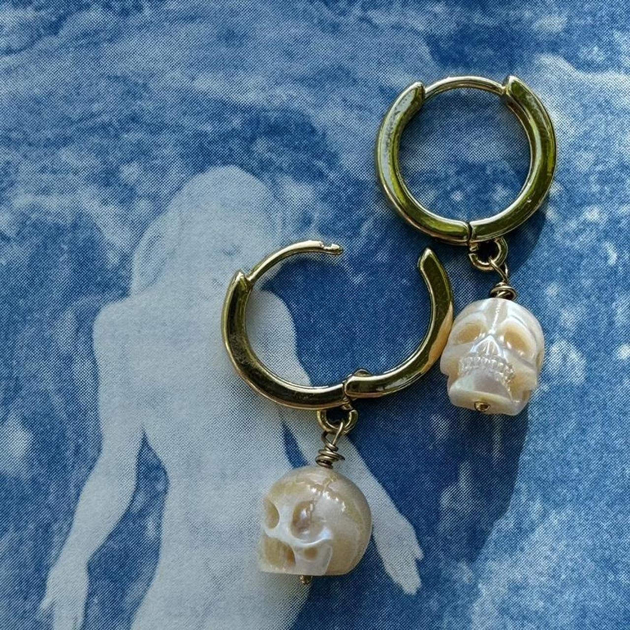 Hand carved (real) pearl skulls on 18k gold filled... | Depop