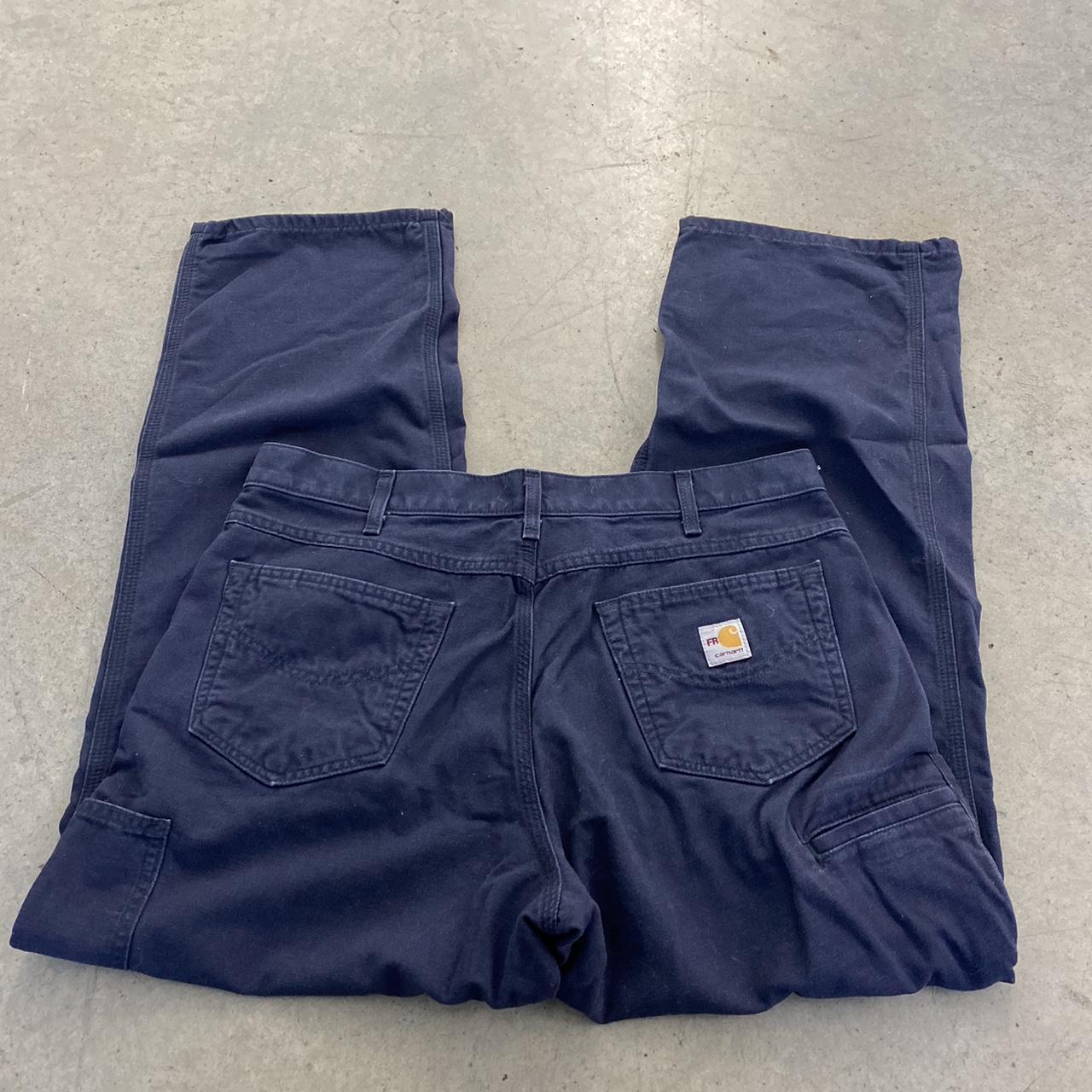 Carhartt FR Pants in navy colorway with patch on the... - Depop