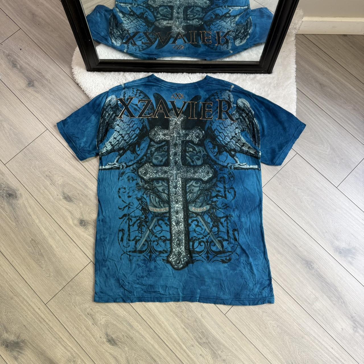 Blue Xzavier tee with cross and wings design #goth... | Depop