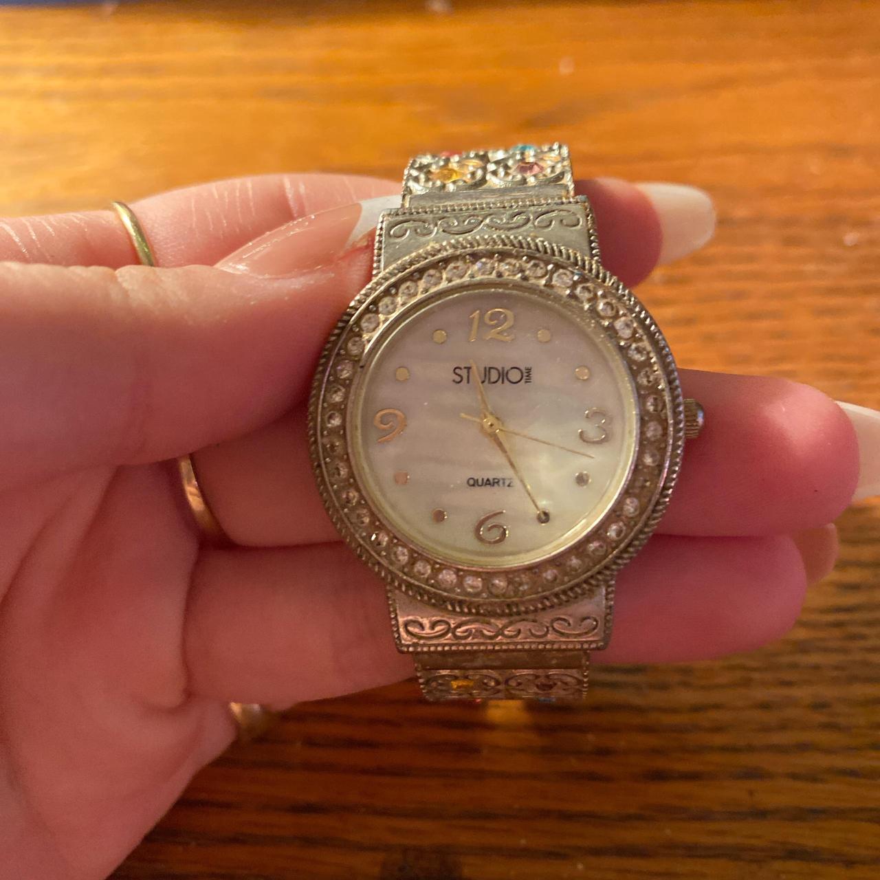 Silver cuff watch with colorful diamonds on the... | Depop