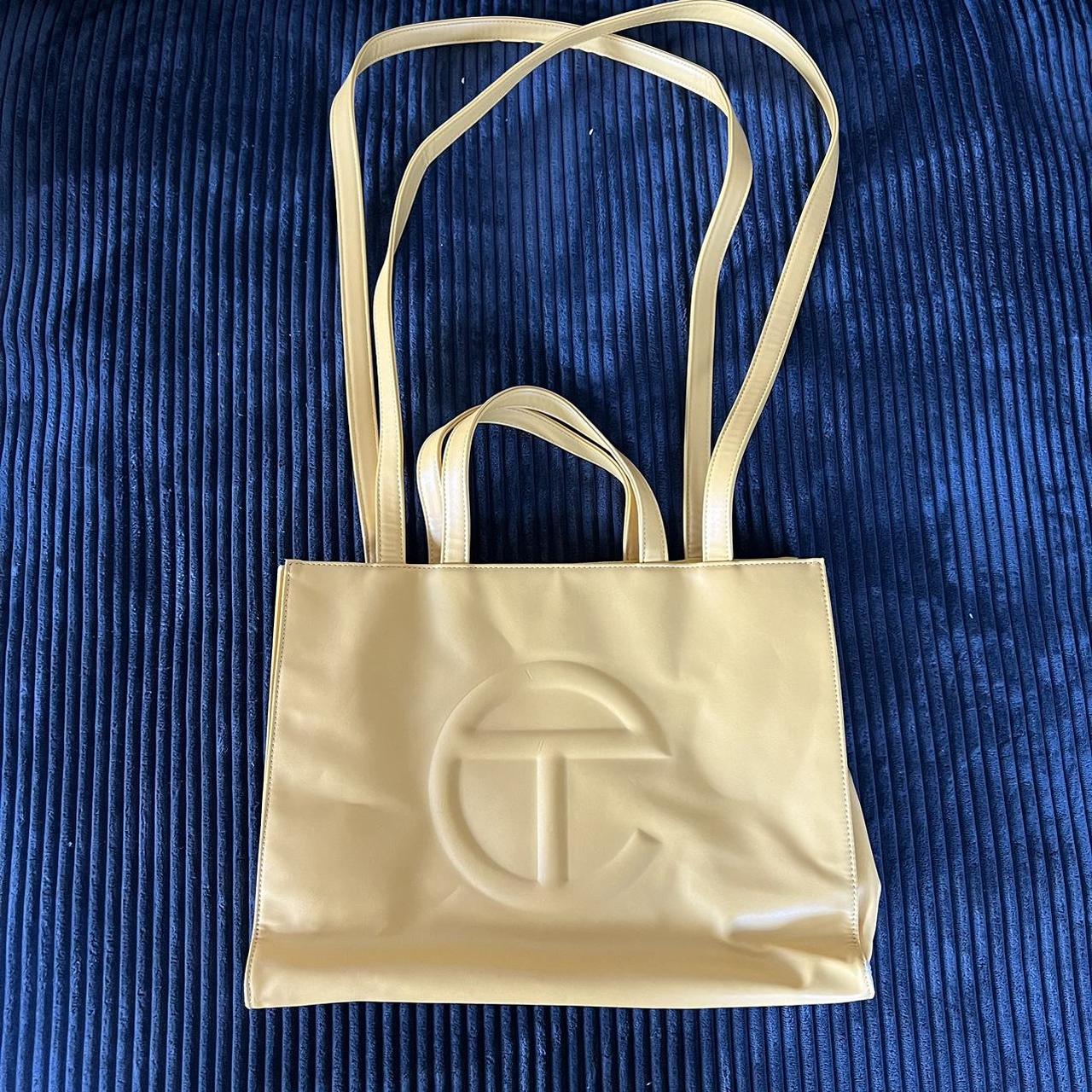Medium Telfar Bag (the inside stain is due to water... - Depop