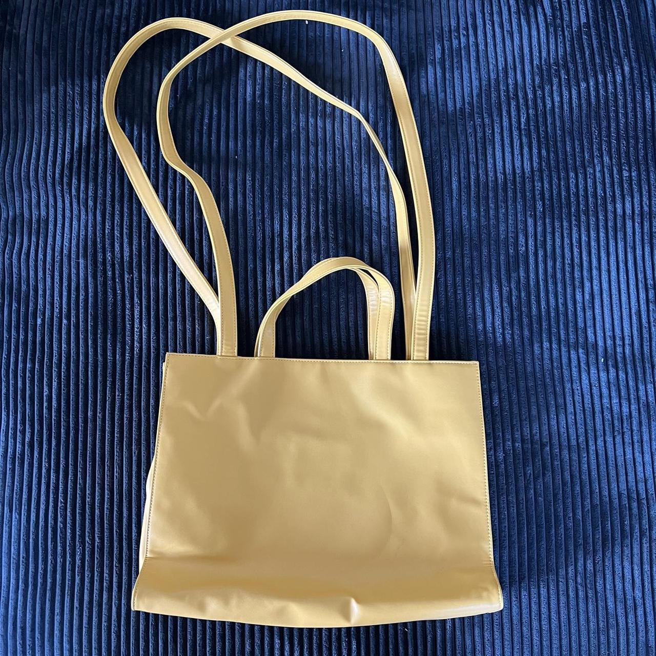 Medium Telfar Bag (the inside stain is due to water... - Depop