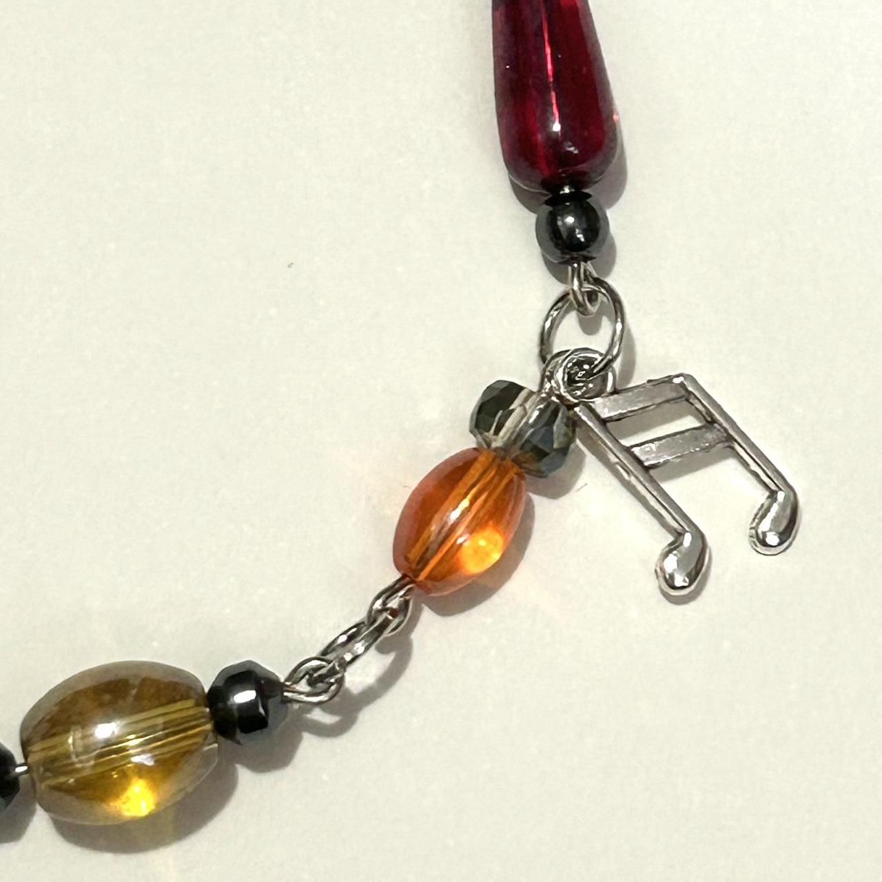 Radiohead in rainbows inspired handmade beaded charm... | Depop