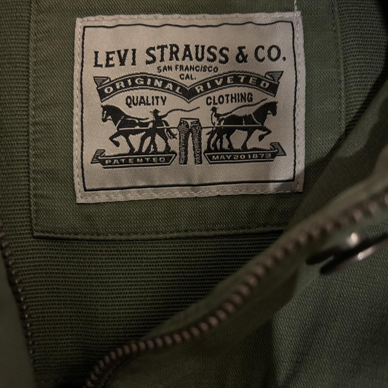 Levi and Strauss army green jacket. It has a zipper... - Depop
