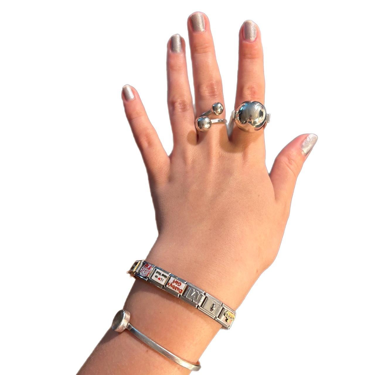 funky silver rings fits about a size 7-8 finger... - Depop