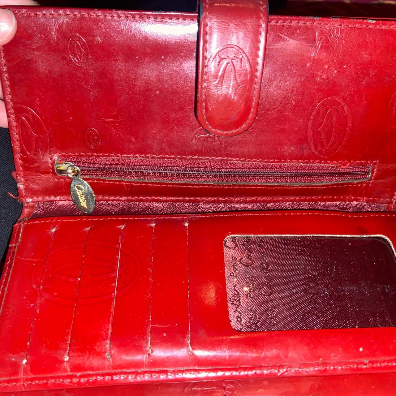this is a Cartier red wallet. In wonderful mint... - Depop