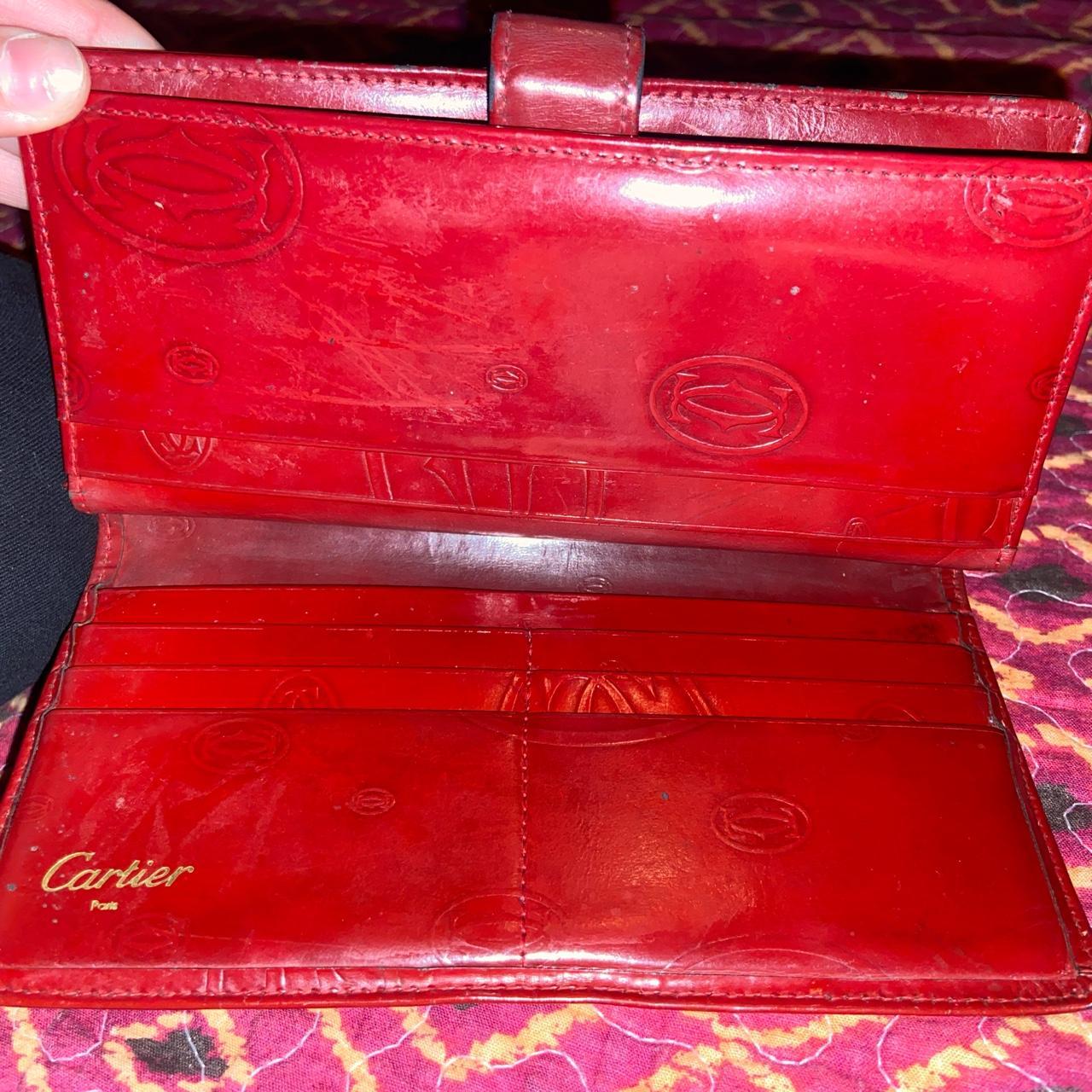 this is a Cartier red wallet. In wonderful mint... - Depop
