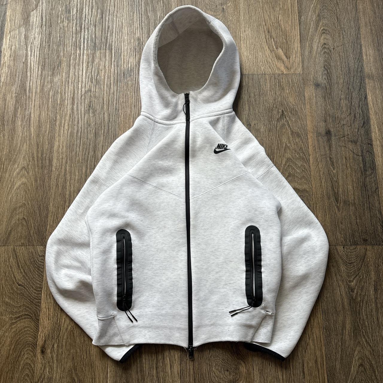 White Nike tech fleece hoodie with small hole near... | Depop