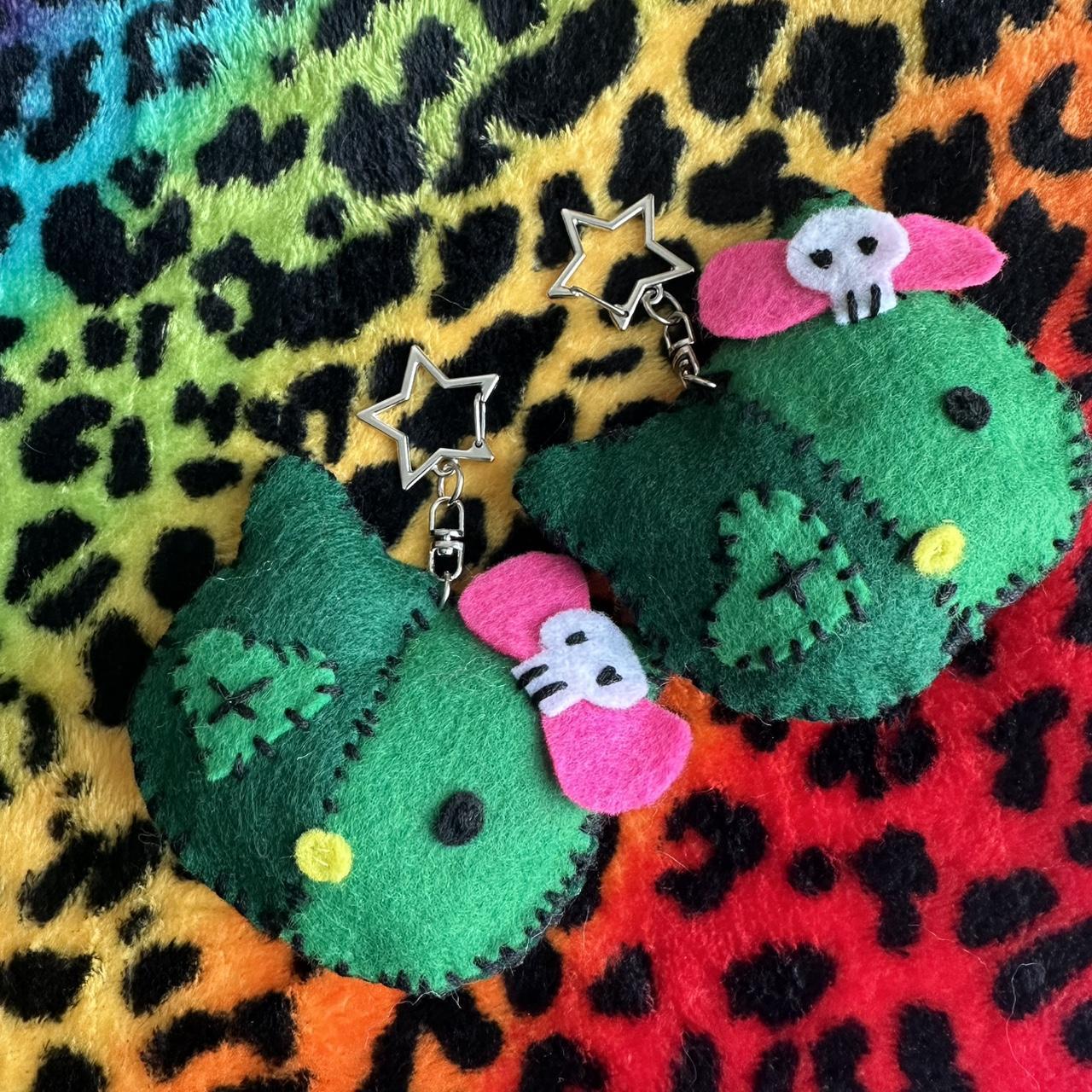 Green and pink zombie hello kitty... | Depop