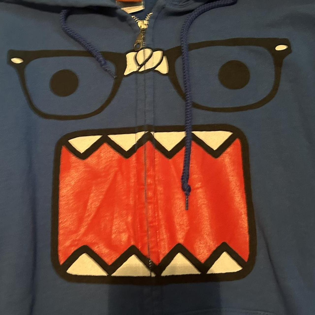 Nerd Domo Kun blue zip up jacket in a size Large... - Depop