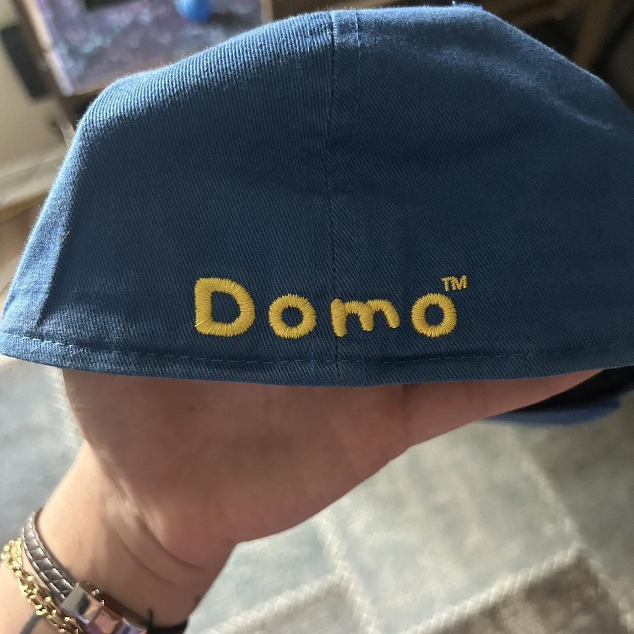 nerd Domo Kun cap has some discoloration on the... - Depop