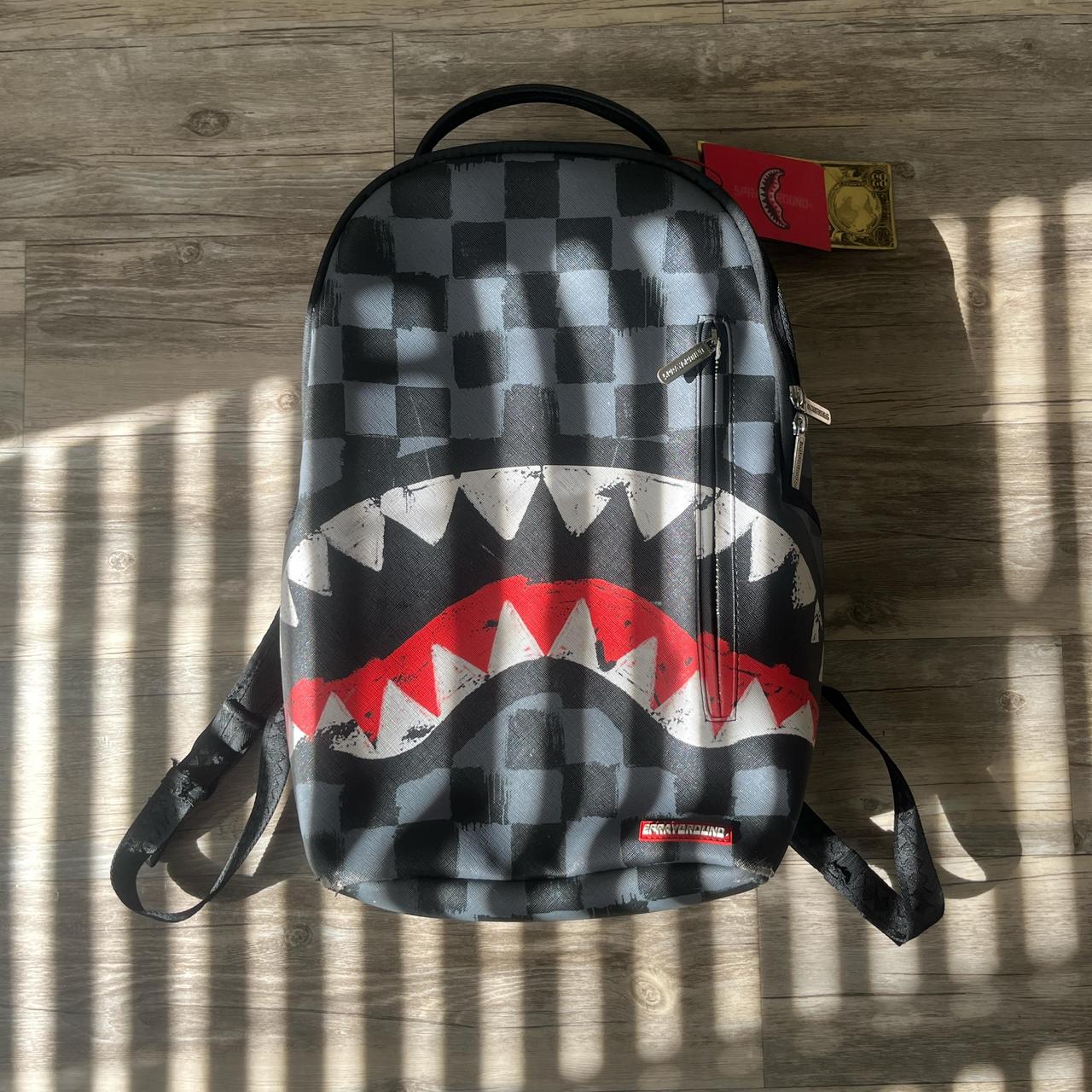 grey and red sprayground backpack with multiple... - Depop
