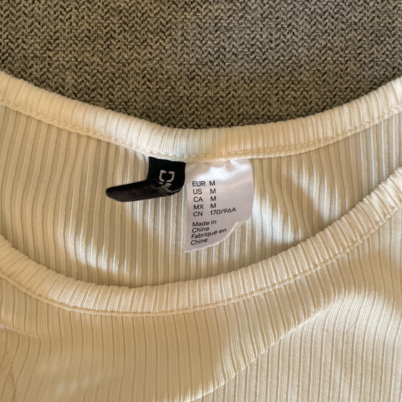 Cute cream cropped tank with a crossed lace - Depop