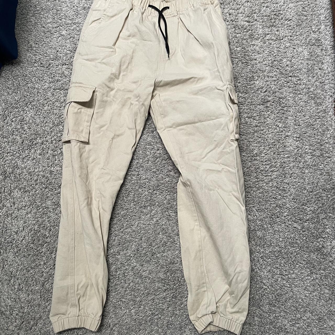 Cream cargo pants size large but fits medium - Depop