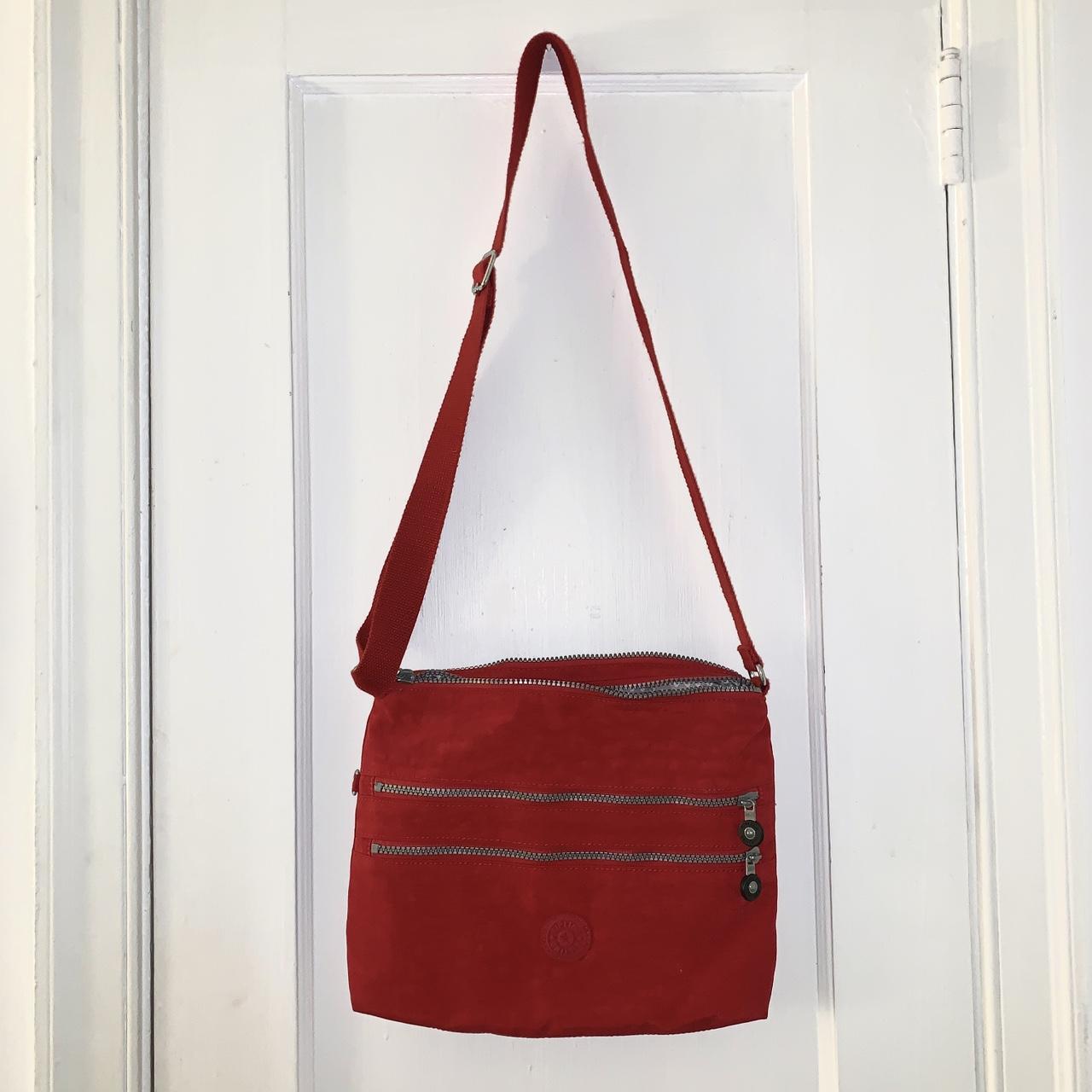 Adorable traveling Kipling purse! Has so much room - Depop