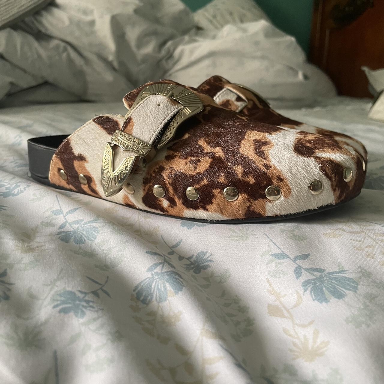 These nice Cow Hide clogs in a size 7 - Depop