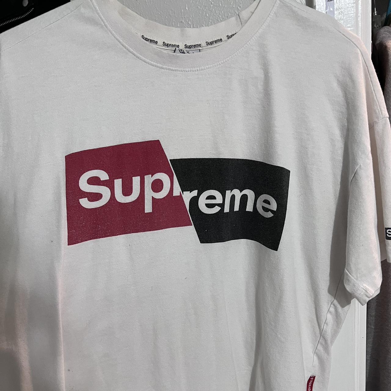 Supreme tshirt, a little stain on the colad but... - Depop