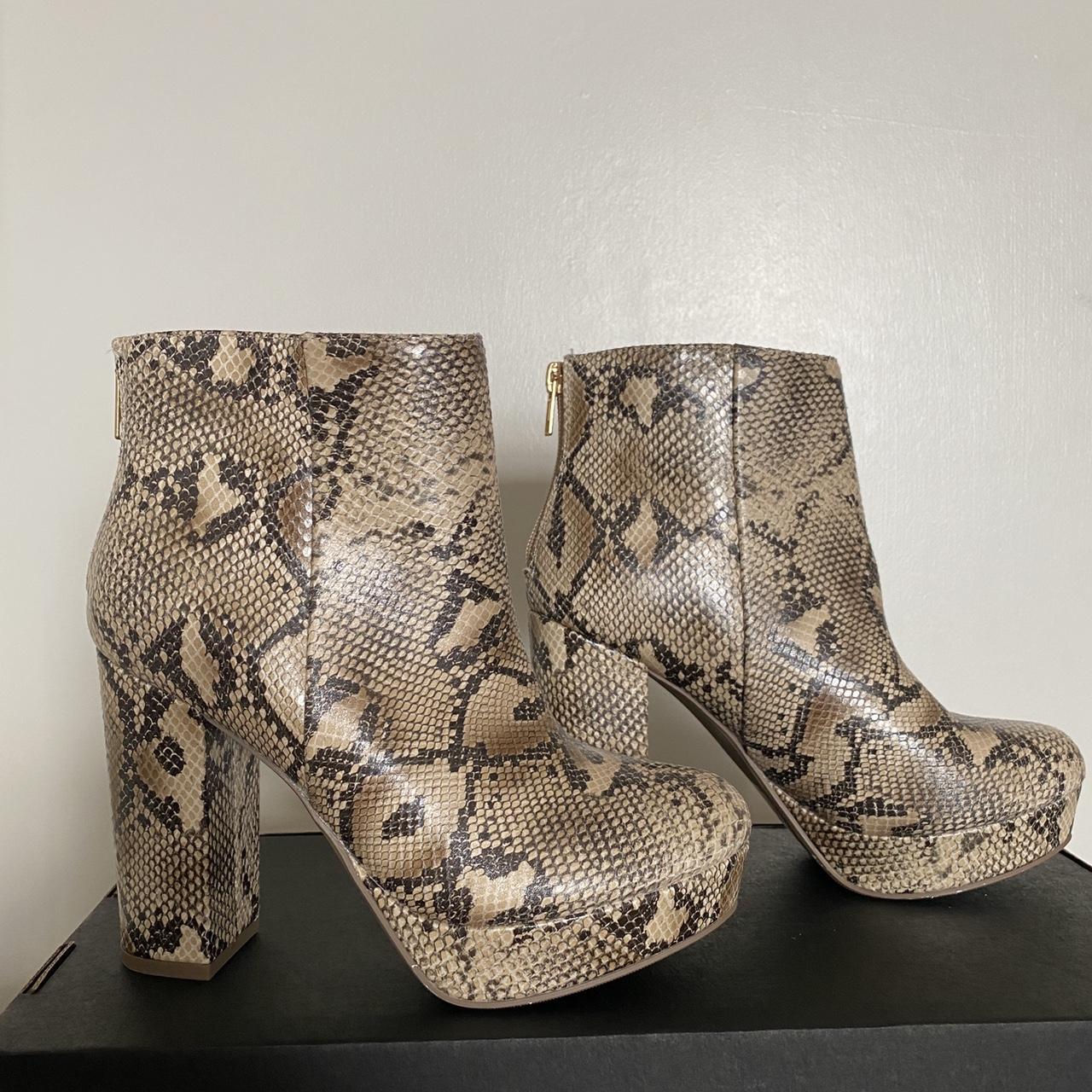 Snakeskin mega heel boot. Never worn, but was... - Depop