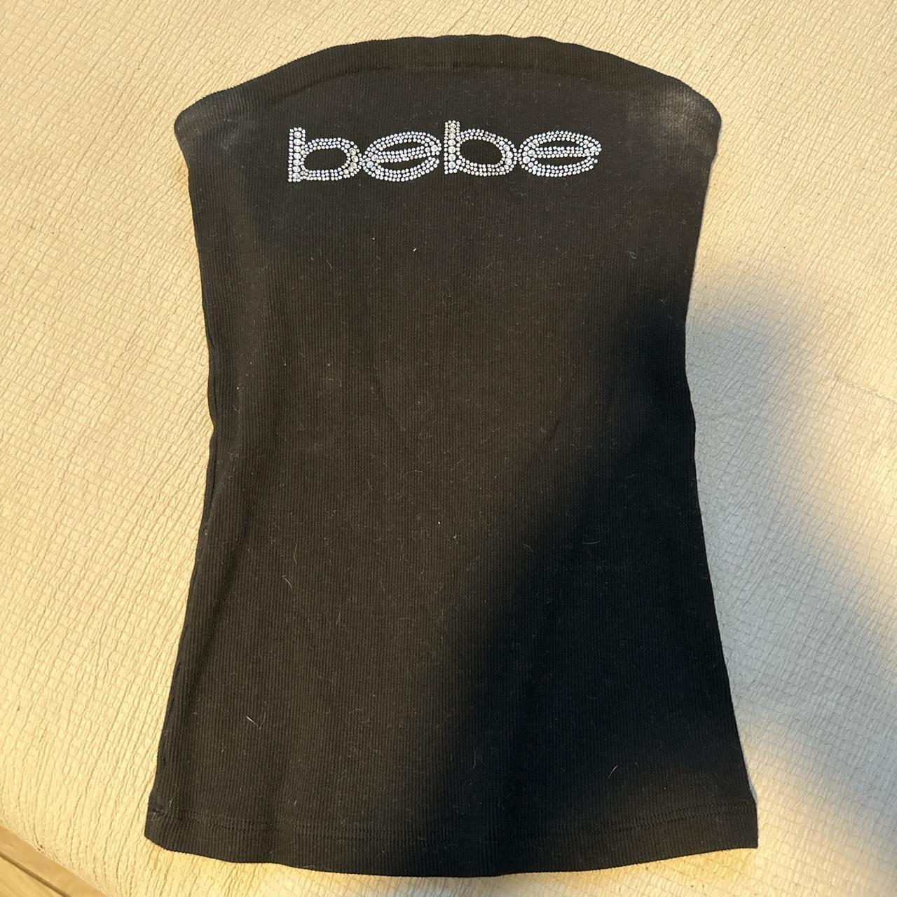 Bebe tube top size medium all black with the words... - Depop